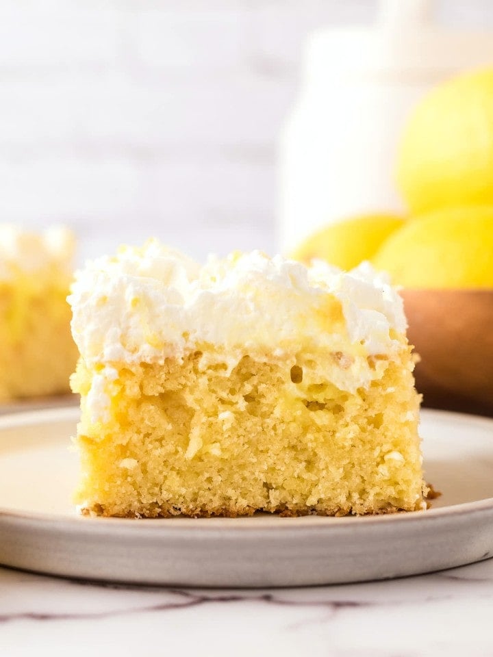 Easy Lemon Poke Cake Perfect For Parties and Potlucks